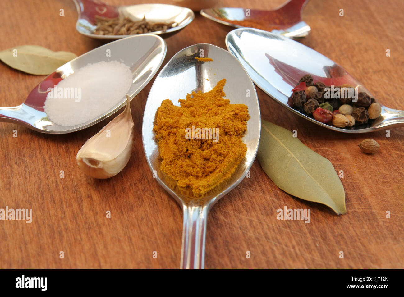 Food seasoning. Cooking spices in a teaspoons Stock Photo - Alamy