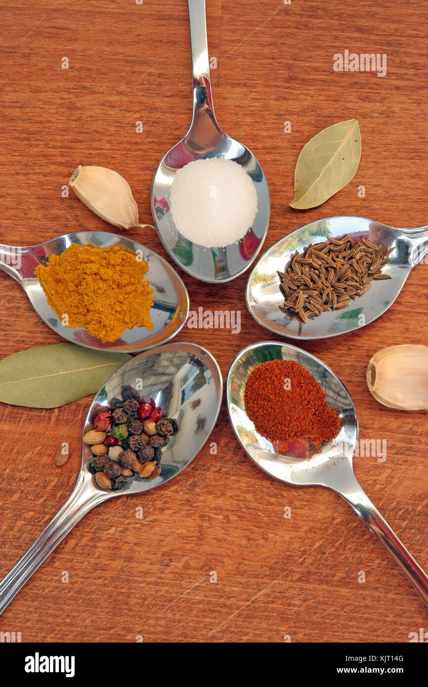 Food seasoning. Cooking spices in a teaspoons Stock Photo - Alamy