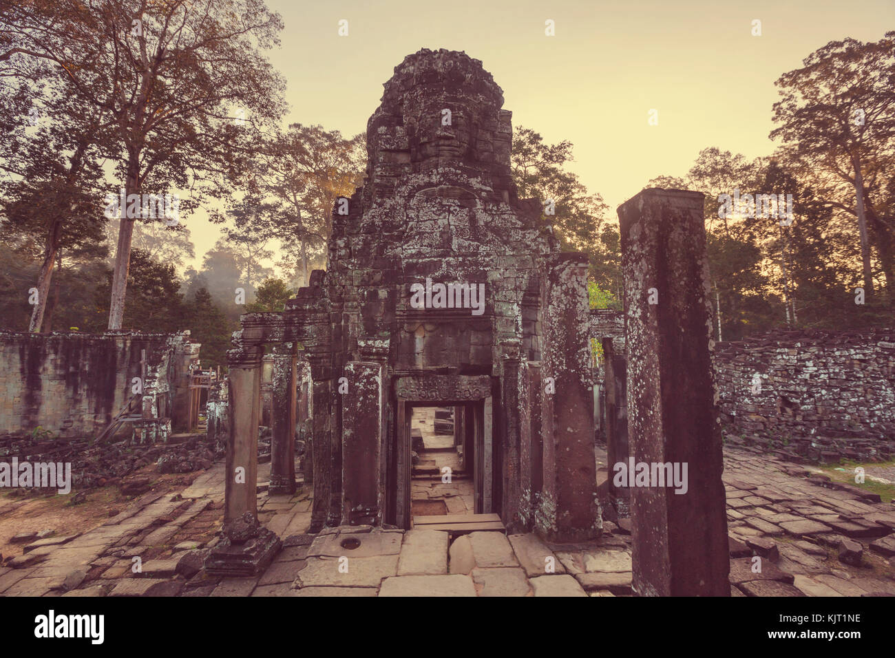 Stone faces of ancient Khmer culture temple of Bayon in Angkor area ...