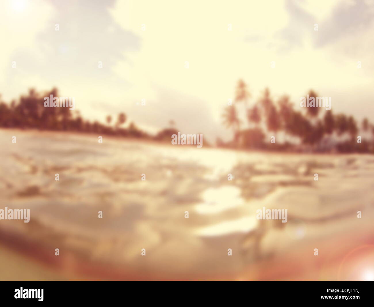 Blurred background with tropical beach Stock Photo - Alamy