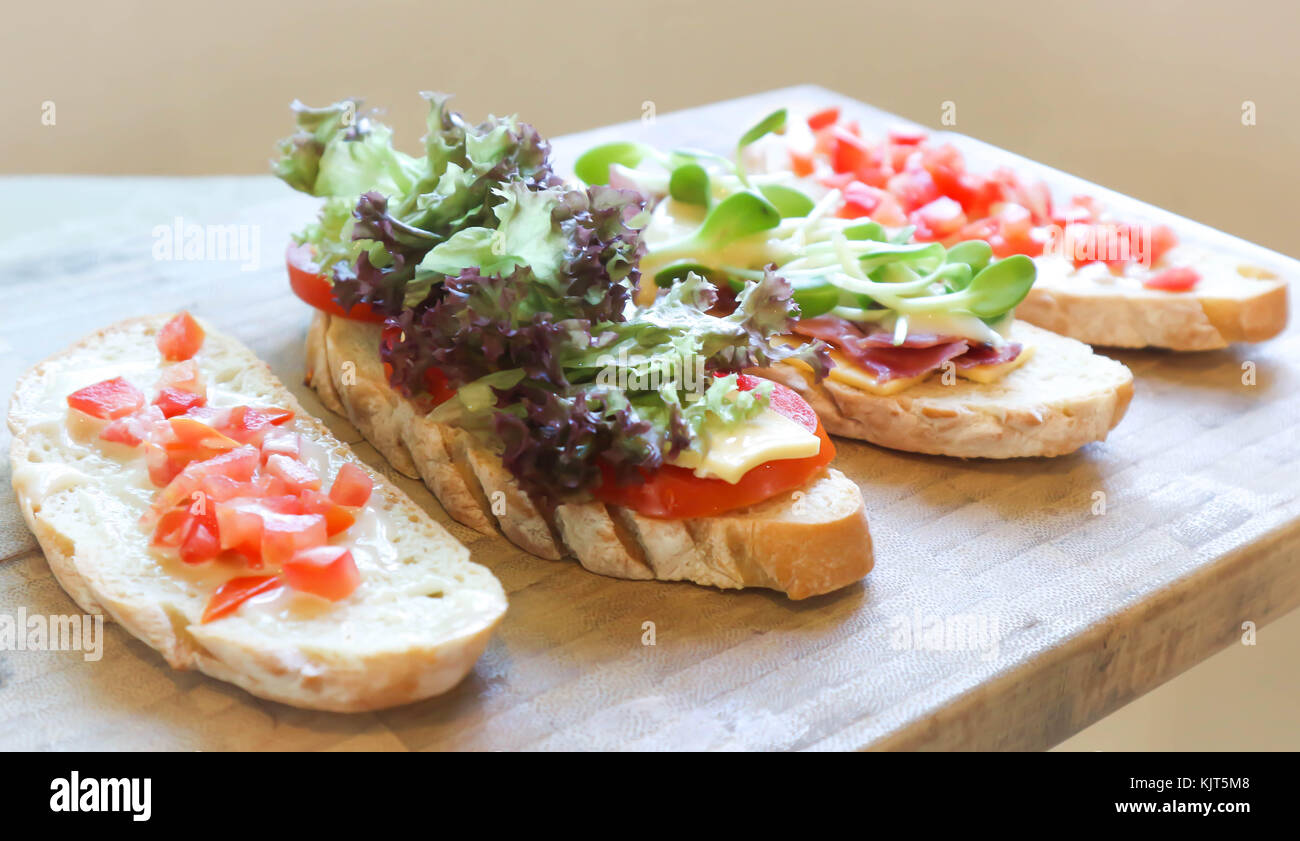 canape , bread with ham and cheese topping Stock Photo - Alamy