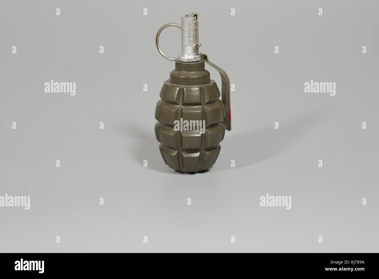 A hand grenade with copy space left for text Stock Photo - Alamy
