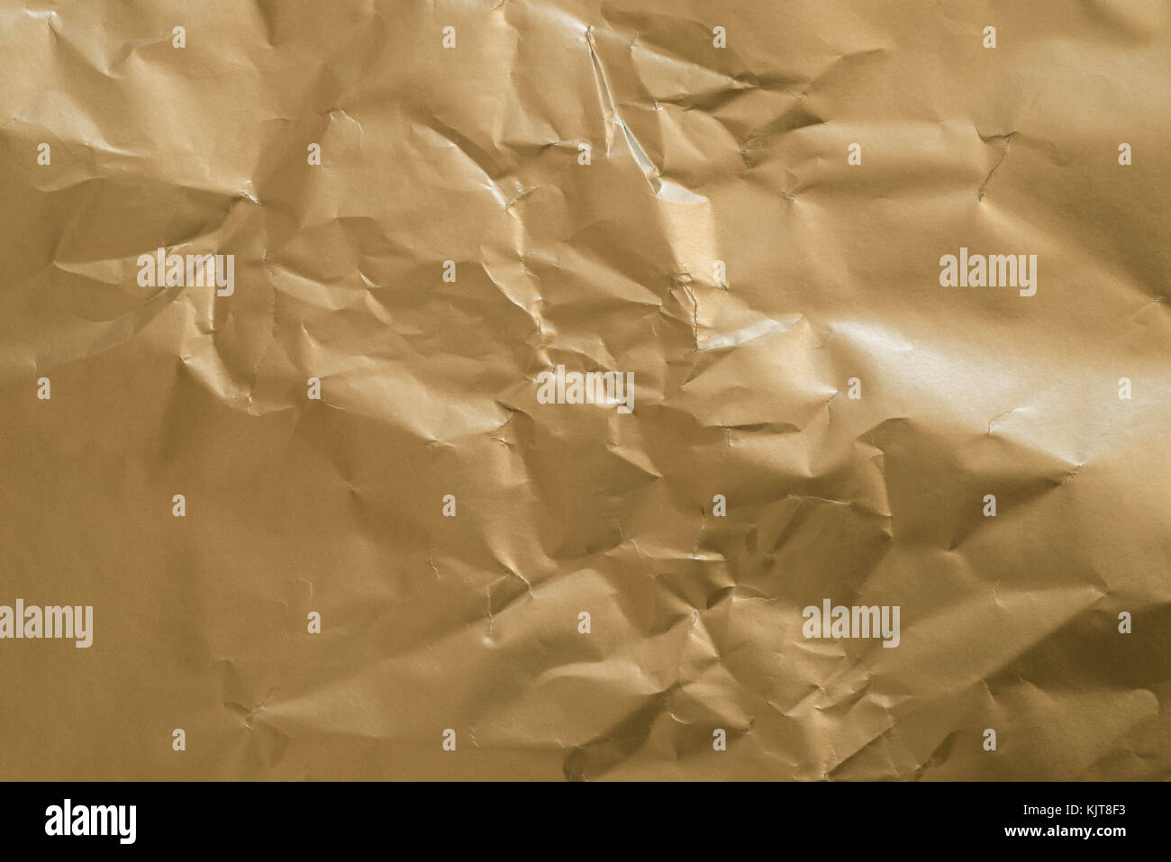 gold color creased paper texture background Stock Photo - Alamy
