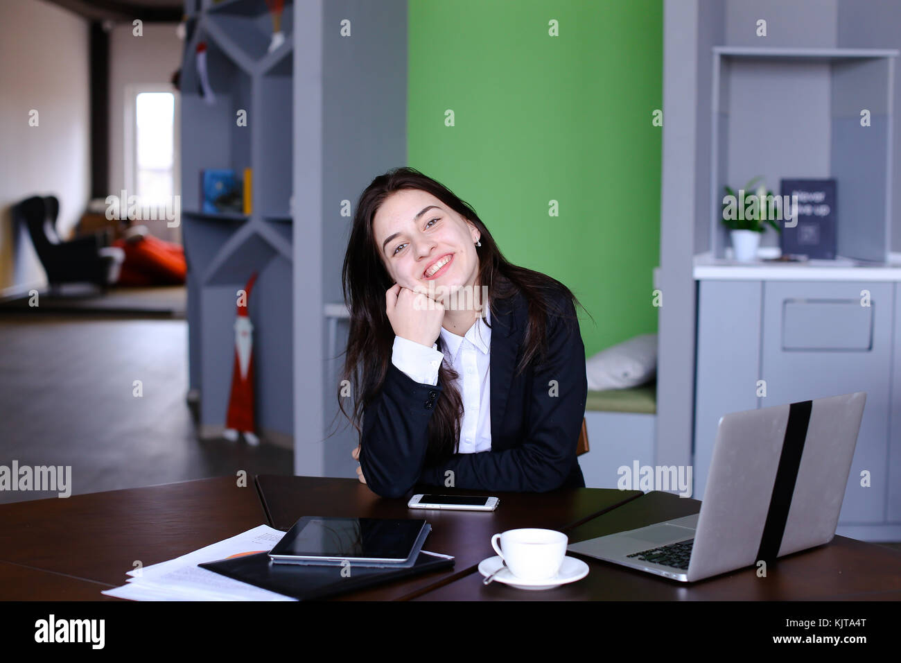 Portrait of beautiful female secretary who poses and looks away Stock ...