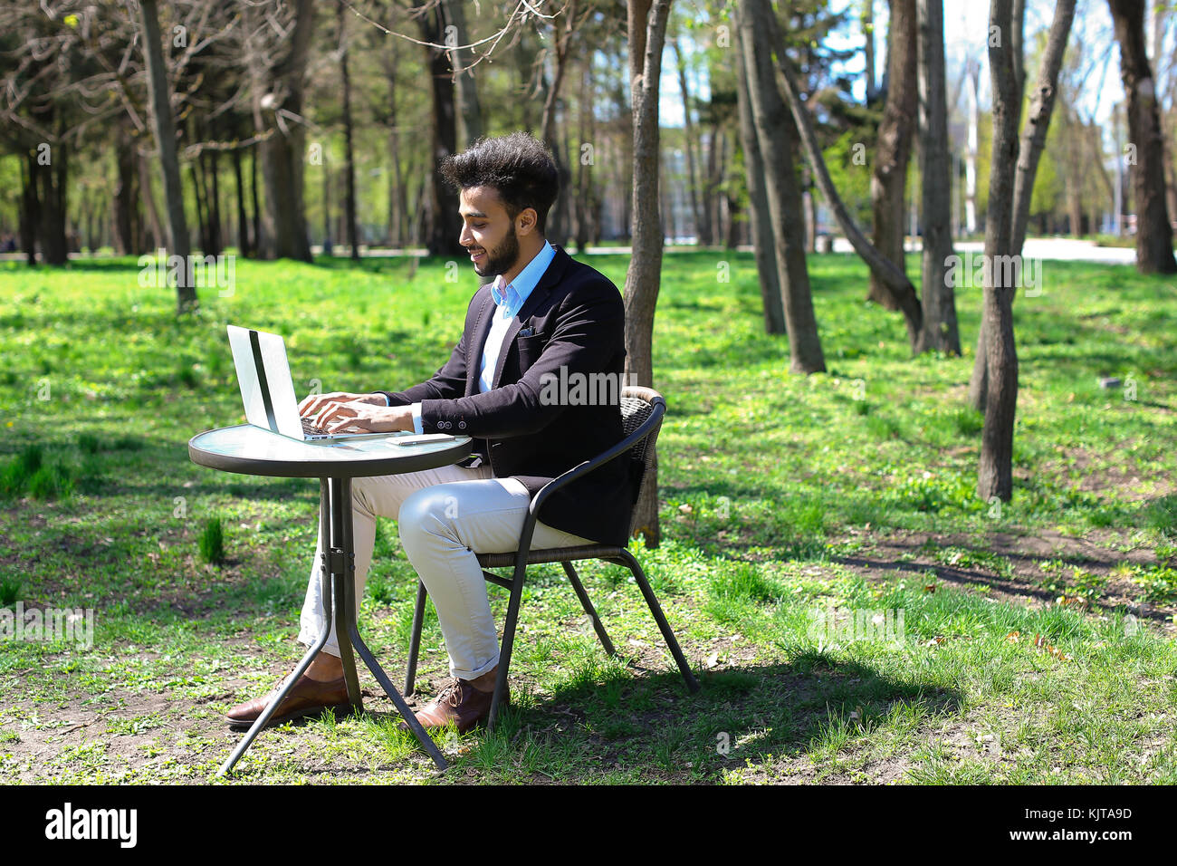 Actor on set of talk show and wave hands to viewers Stock Photo - Alamy