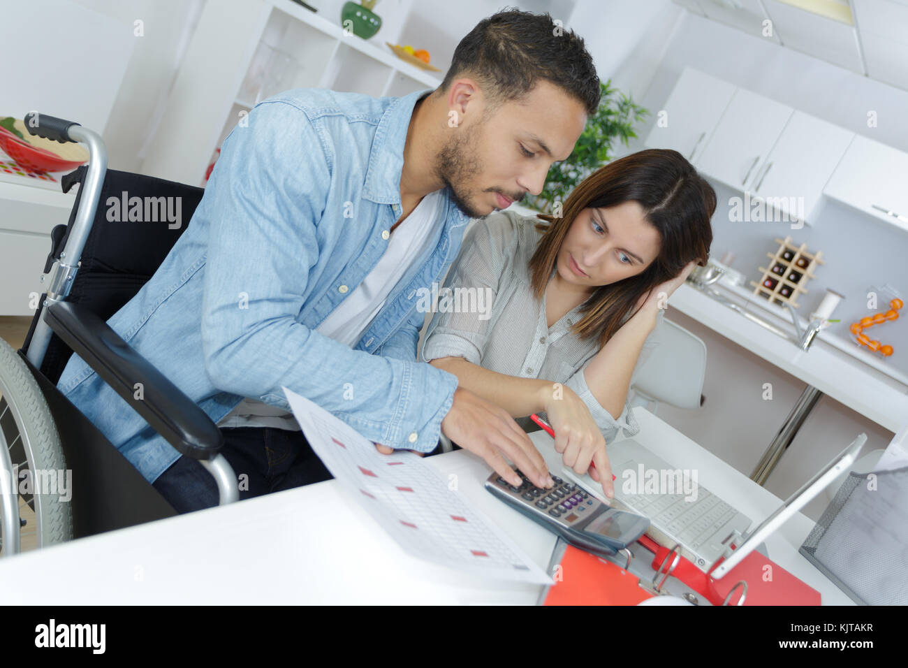 young attractive couple accounting at home Stock Photo - Alamy