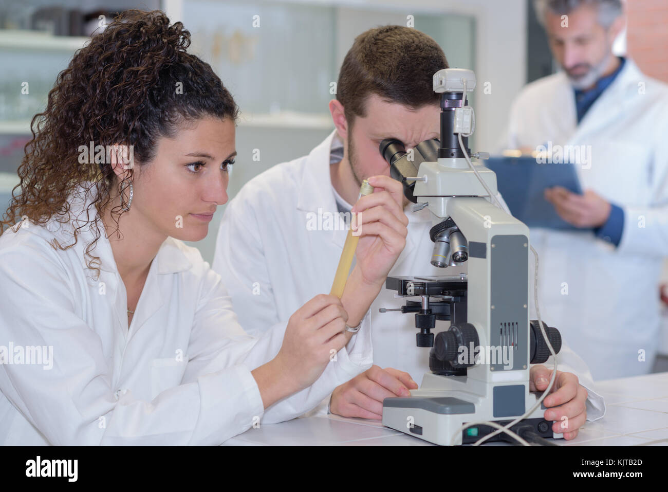 microscope intern and laboratory Stock Photo - Alamy