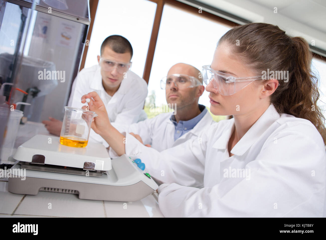 laboratory students and teacher Stock Photo - Alamy