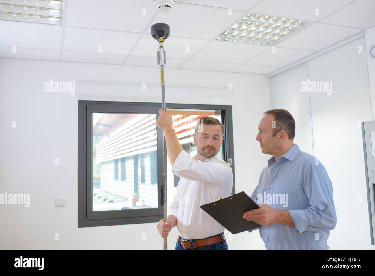 testing a new fire detector Stock Photo - Alamy