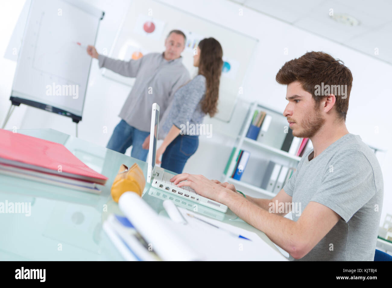 young student using a laptop computer classroom Stock Photo - Alamy
