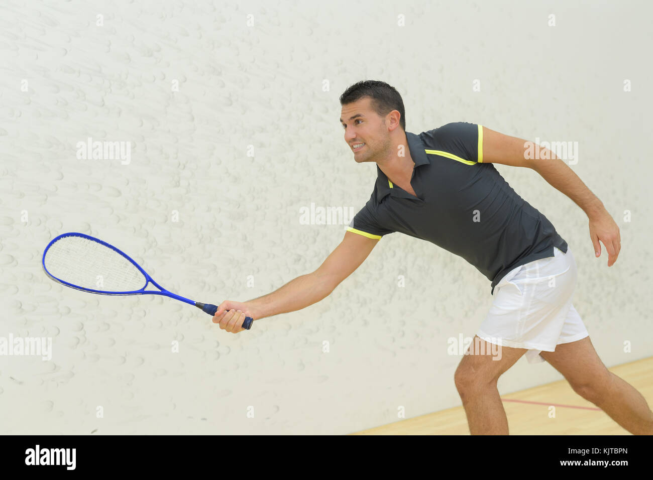 man playing squash Stock Photo - Alamy