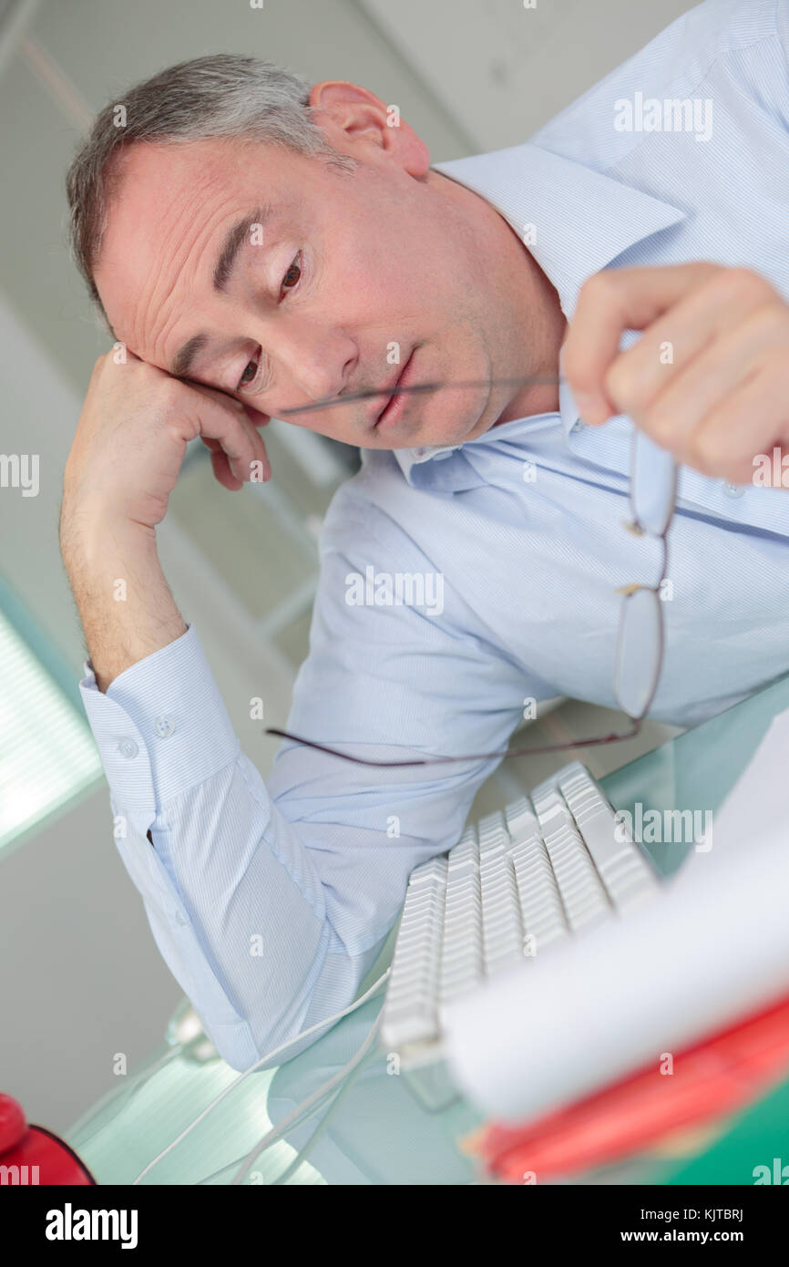 Tired office male clerk hi-res stock photography and images - Alamy