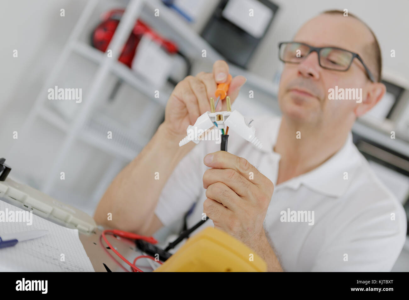technical electrician at work Stock Photo - Alamy