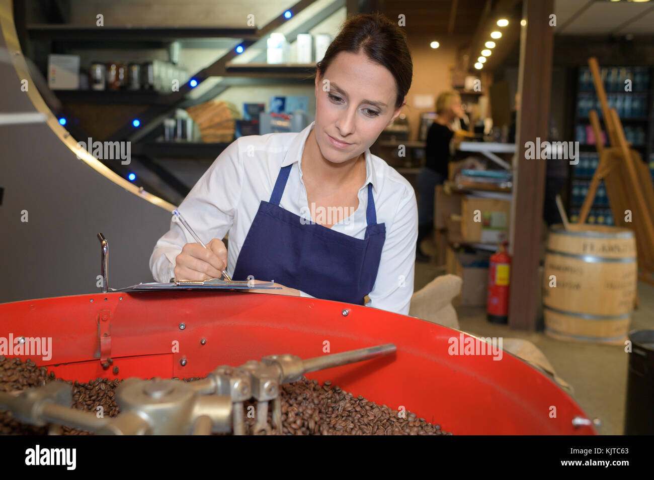 female worker at a coffee at coffee factory Stock Photo - Alamy