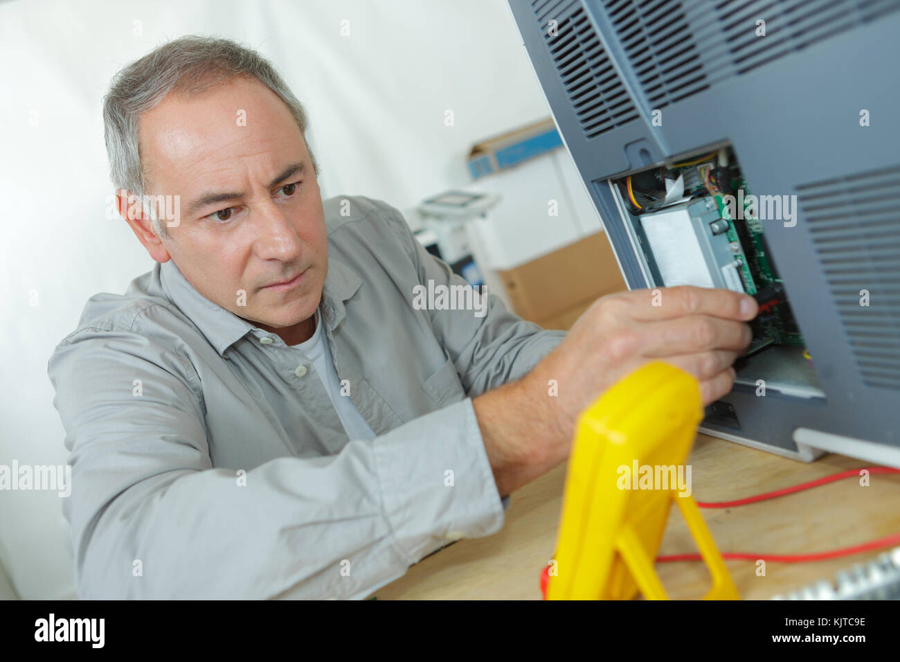 engineer measuring multimeter panel board Stock Photo - Alamy
