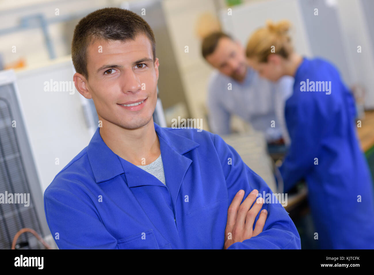 Portrait of young man in blue jacket Stock Photo - Alamy