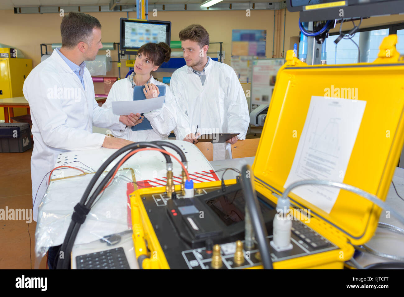 Students near portable electric terminal Stock Photo - Alamy