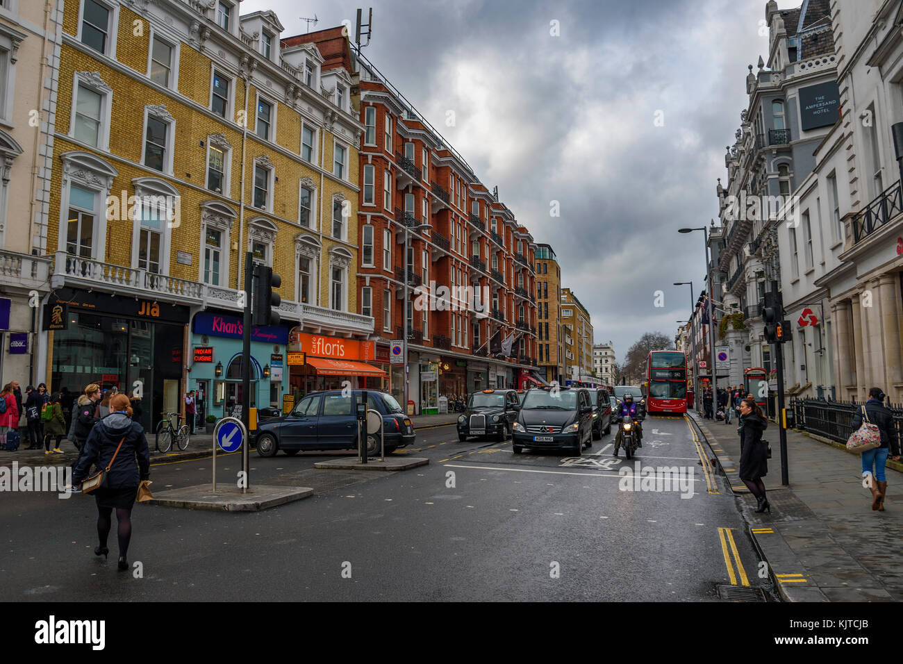 Architectural buildings and street traffic in a typical day in central ...