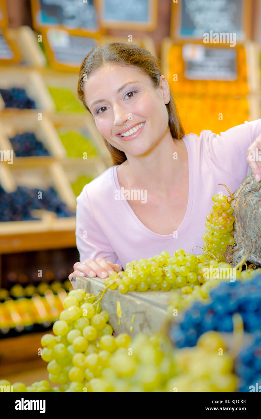Buying some grapes Stock Photo - Alamy