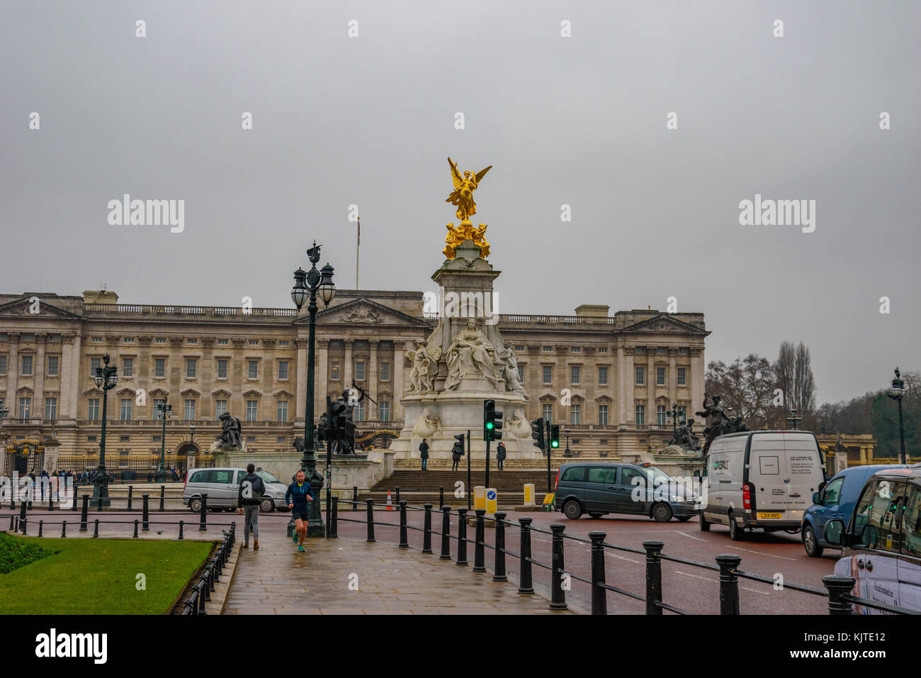 Golden statue of wisdom in front of Buckingham palace on the (Queen) Victoria Memorial outside ...