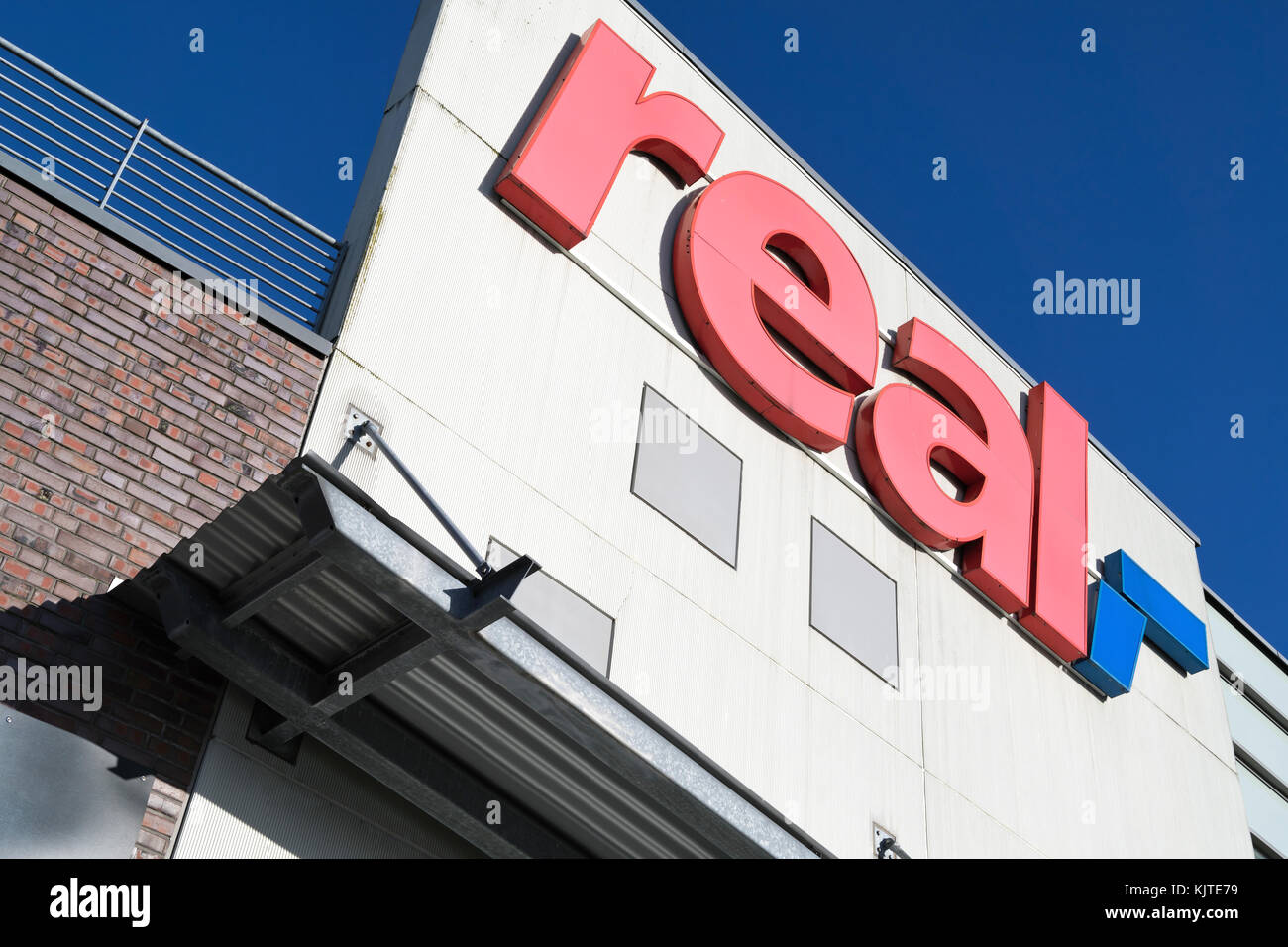 real sign branch. Real operates about 280 hypermarkets in Germany and ...