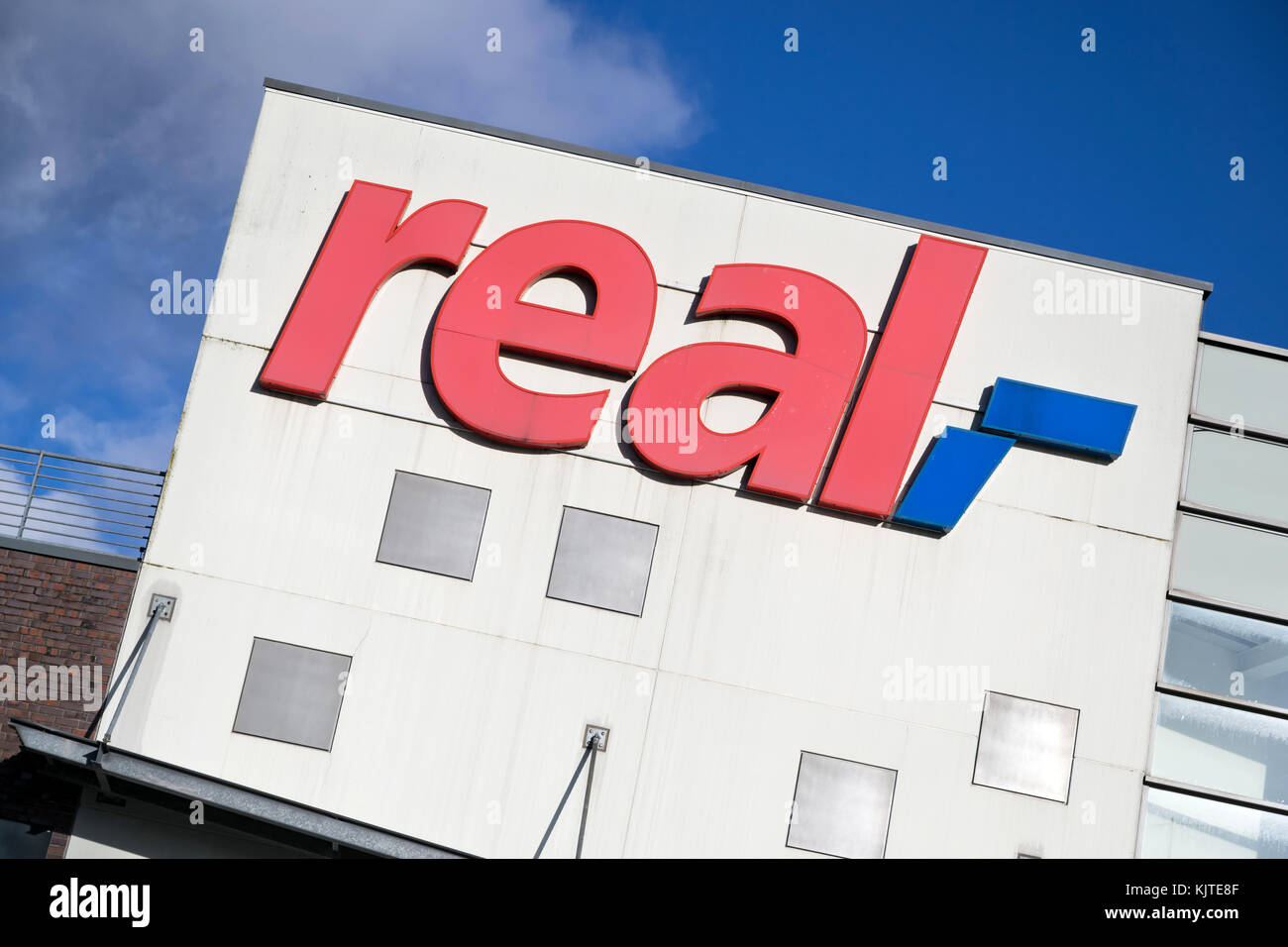 real sign branch. Real operates about 280 hypermarkets in Germany and ...
