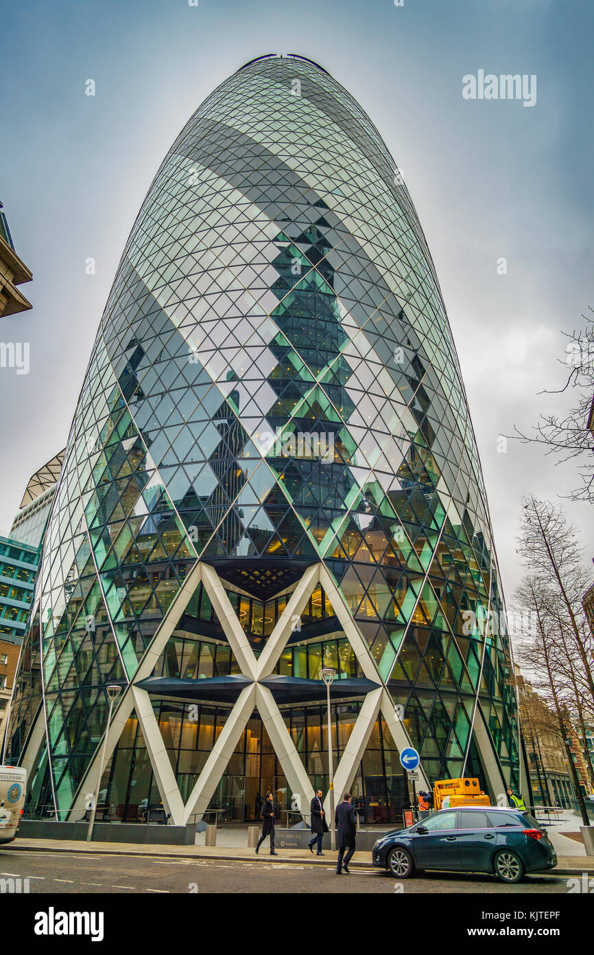 Modern architectural buildings of urban London against a cloudy sky ...