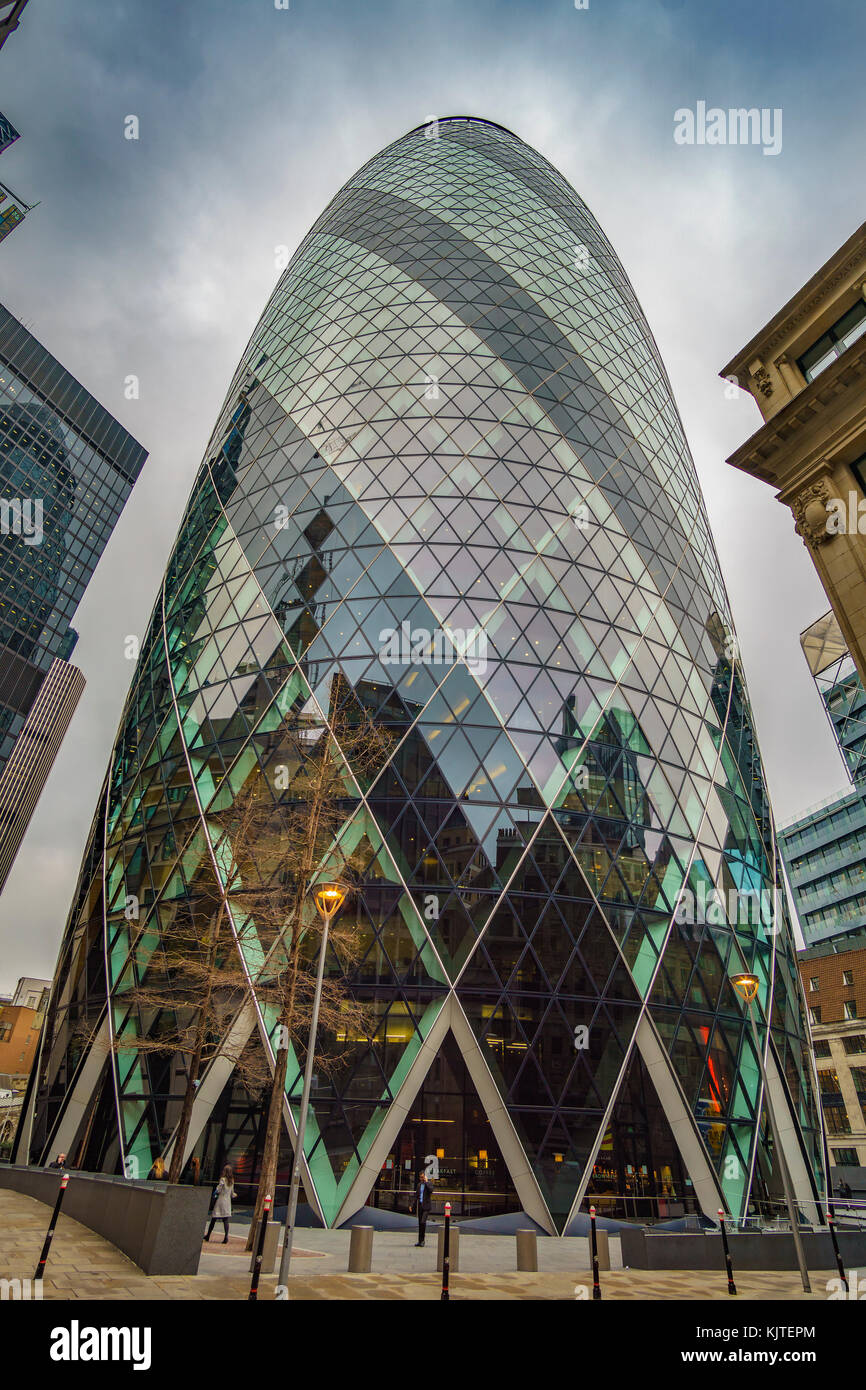 Modern architectural buildings of urban London against a cloudy sky ...