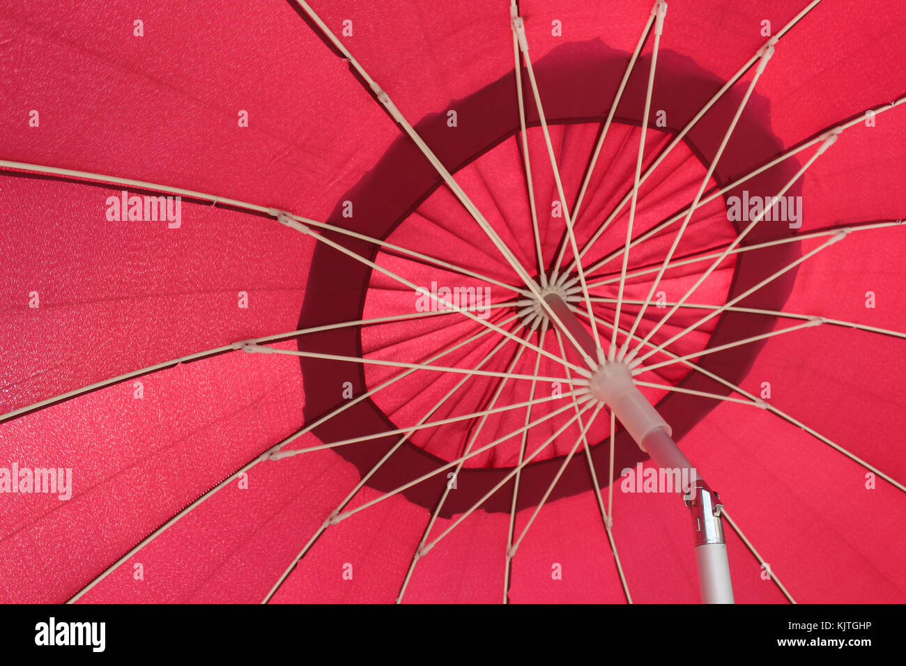 under red umbrellar background Stock Photo - Alamy