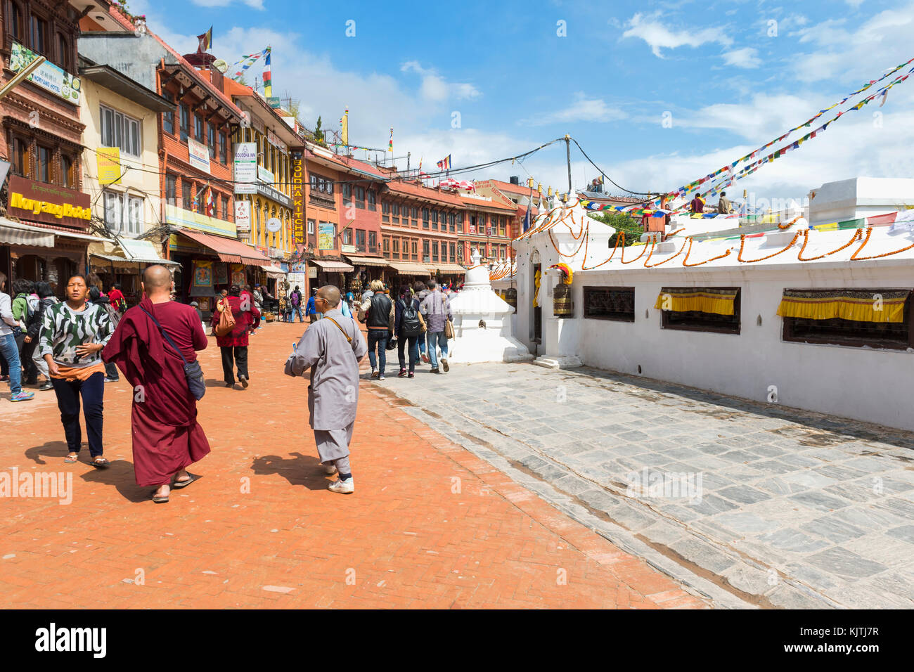 Buddhist pilgrims making the kora or ritual circumnavigation around the ...