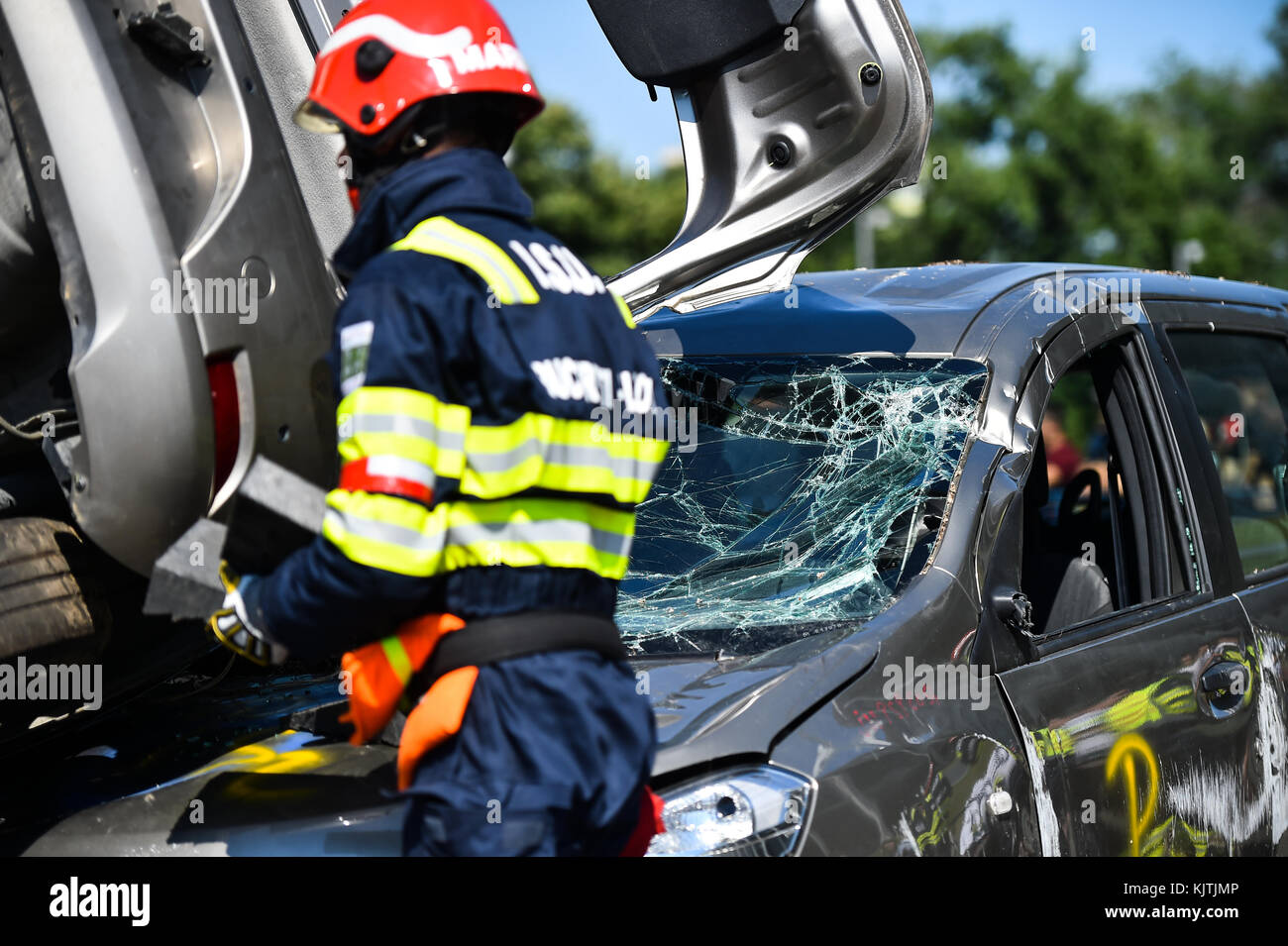 Scene of a car crash and emergency rescue service in action Stock Photo ...