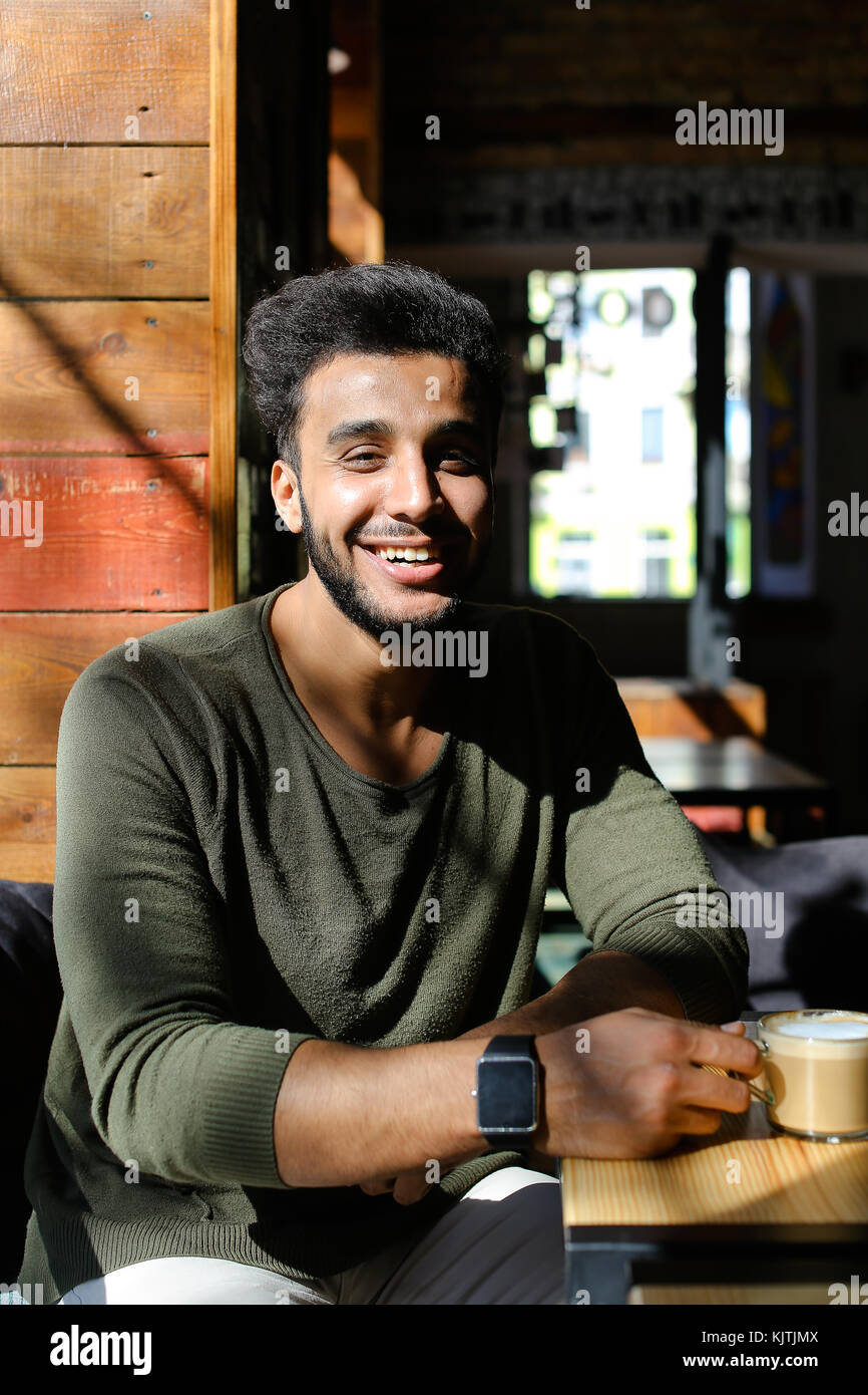 Young bodybuilder wasting time after training Stock Photo - Alamy