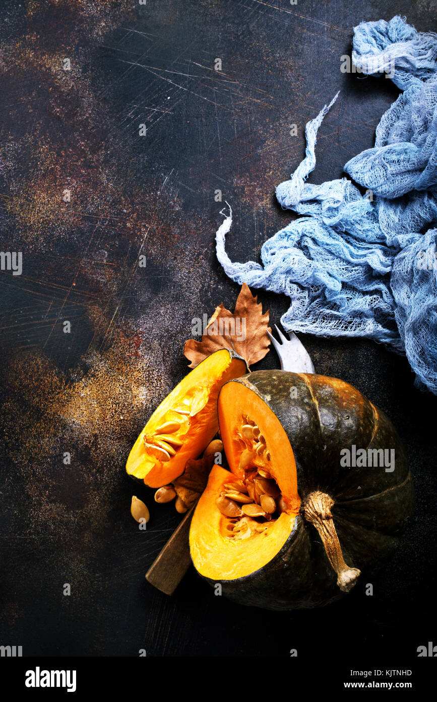 raw pampkin on a table, stock photo Stock Photo - Alamy