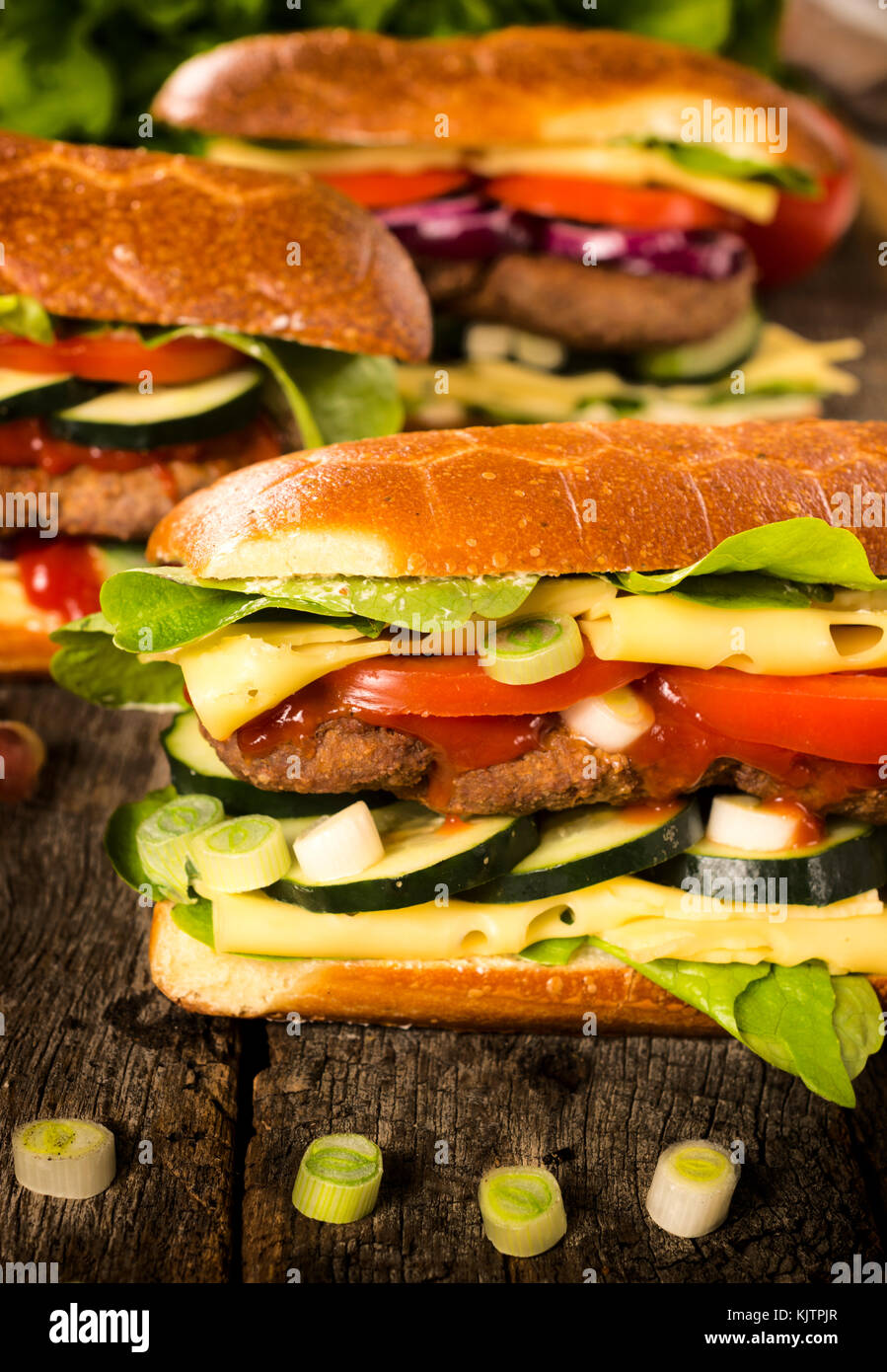 Selective focus in the middle of front burger sandwich Stock Photo - Alamy