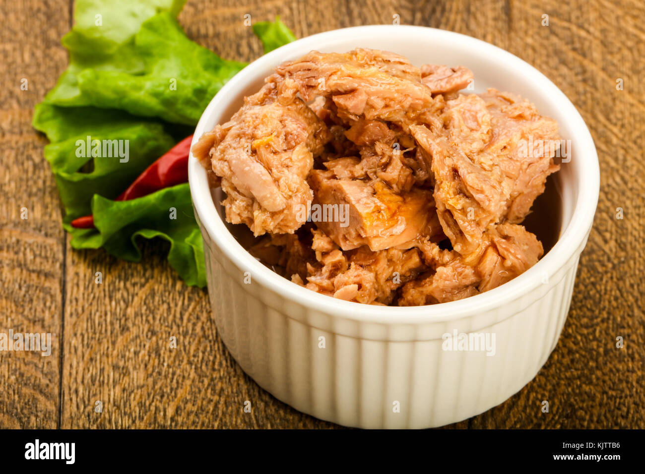 Canned tuna fish in the bowl ready for cooking Stock Photo - Alamy