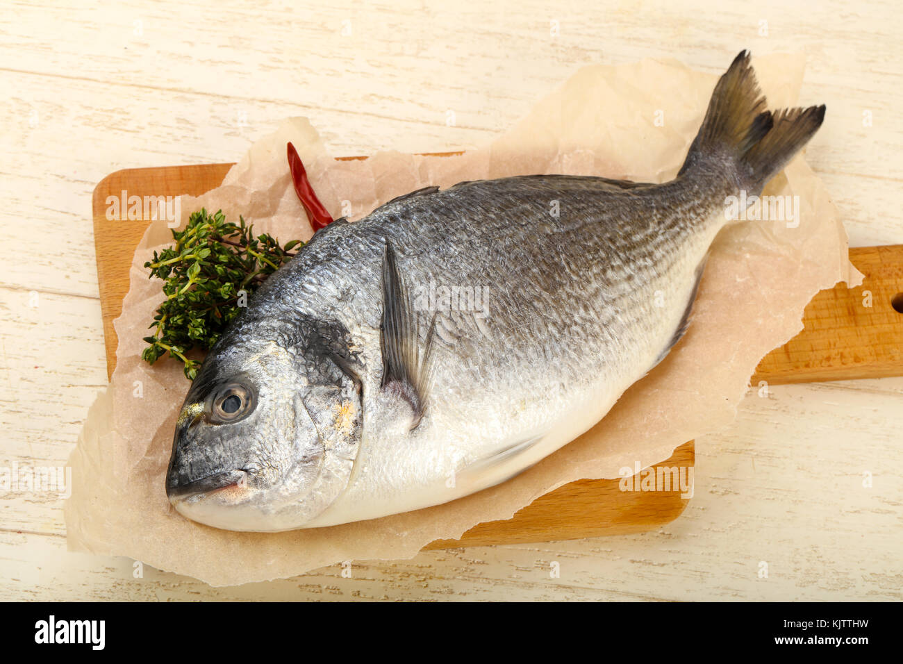 raw dorada fish - ready for cooking Stock Photo - Alamy