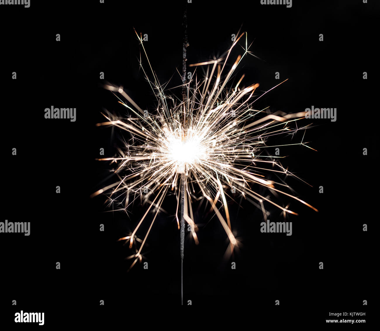 Burning sparkler on a dark or black background Stock Photo - Alamy
