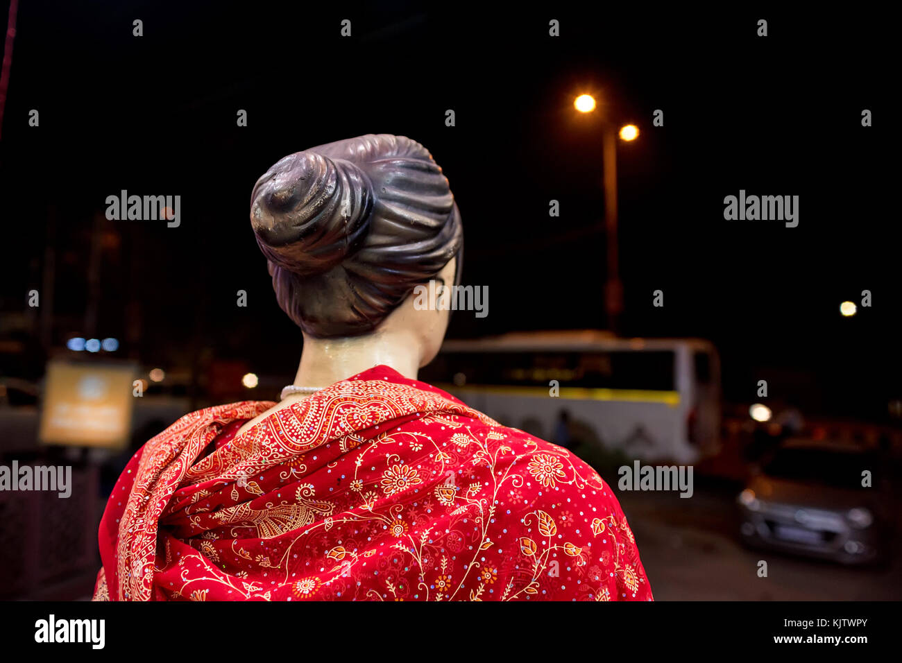 Back view mannequin wearing red sari Stock Photo - Alamy