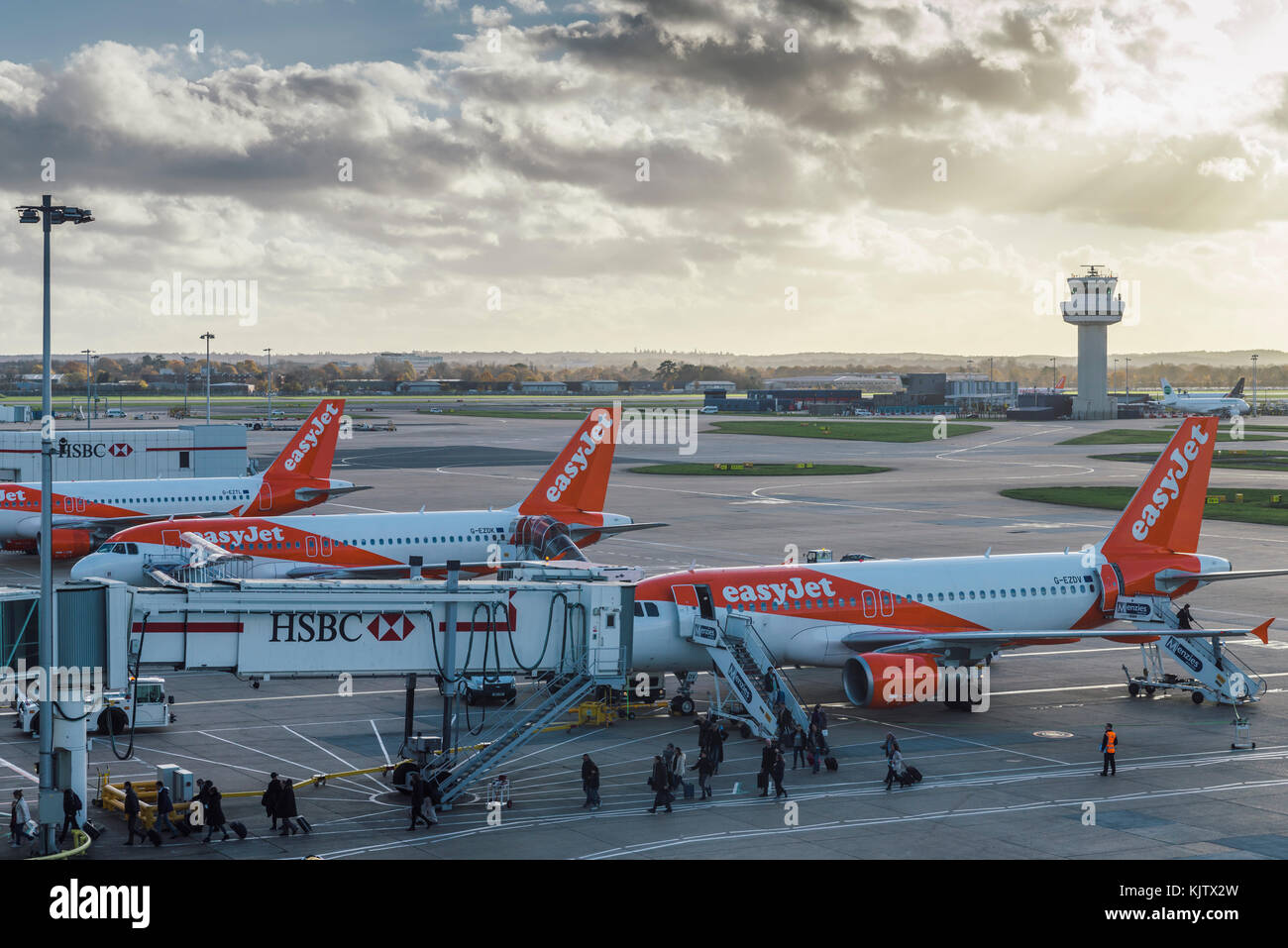 Passengers disembark an airplane hi-res stock photography and images ...