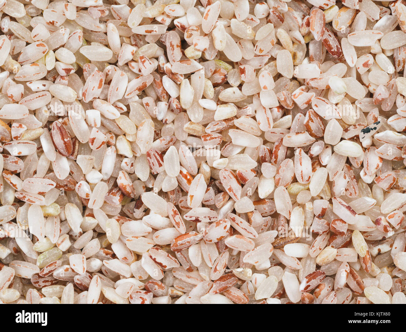 Red rice background Stock Photo - Alamy