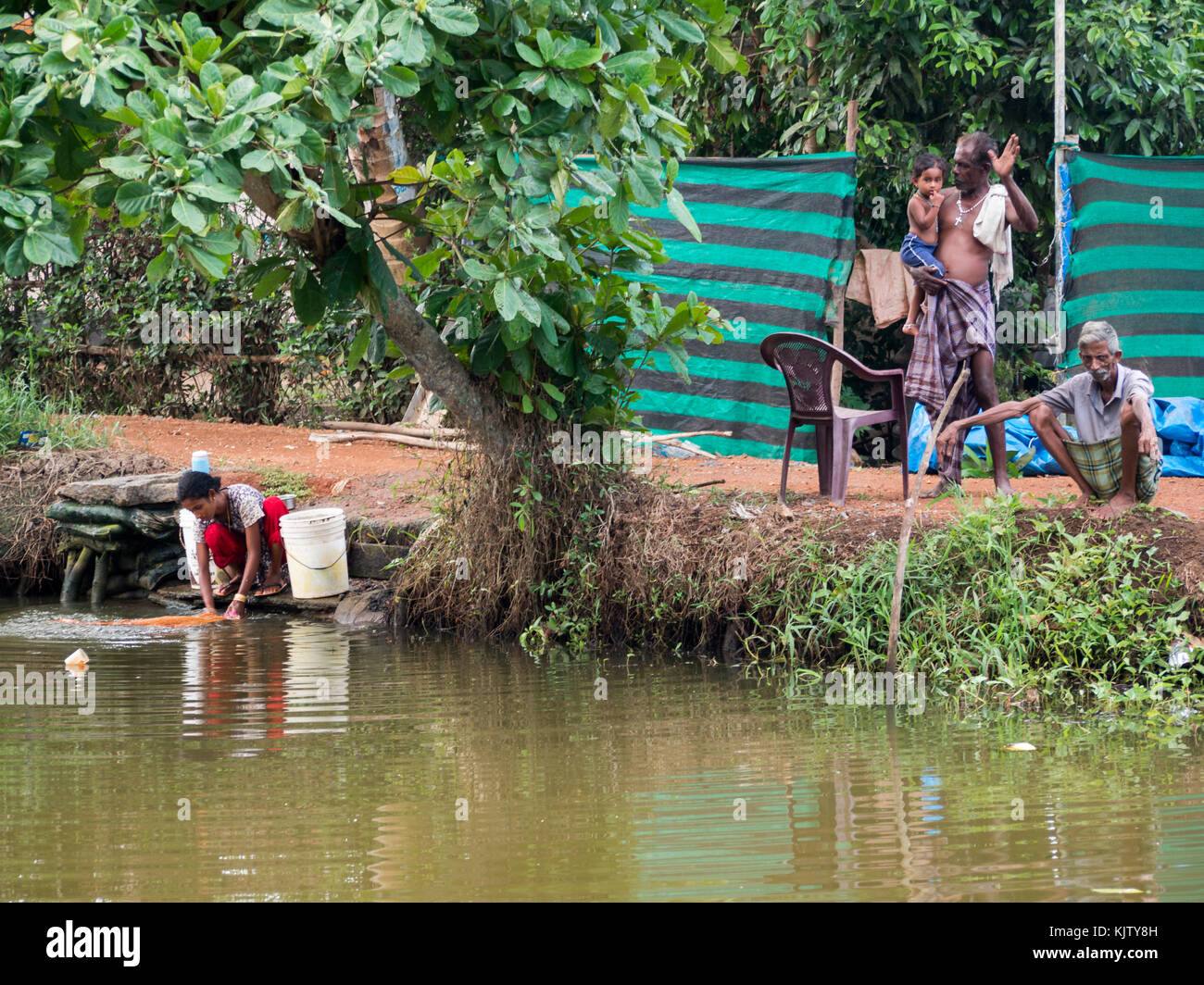 Life by the canals of Kerala backwaters Stock Photo - Alamy