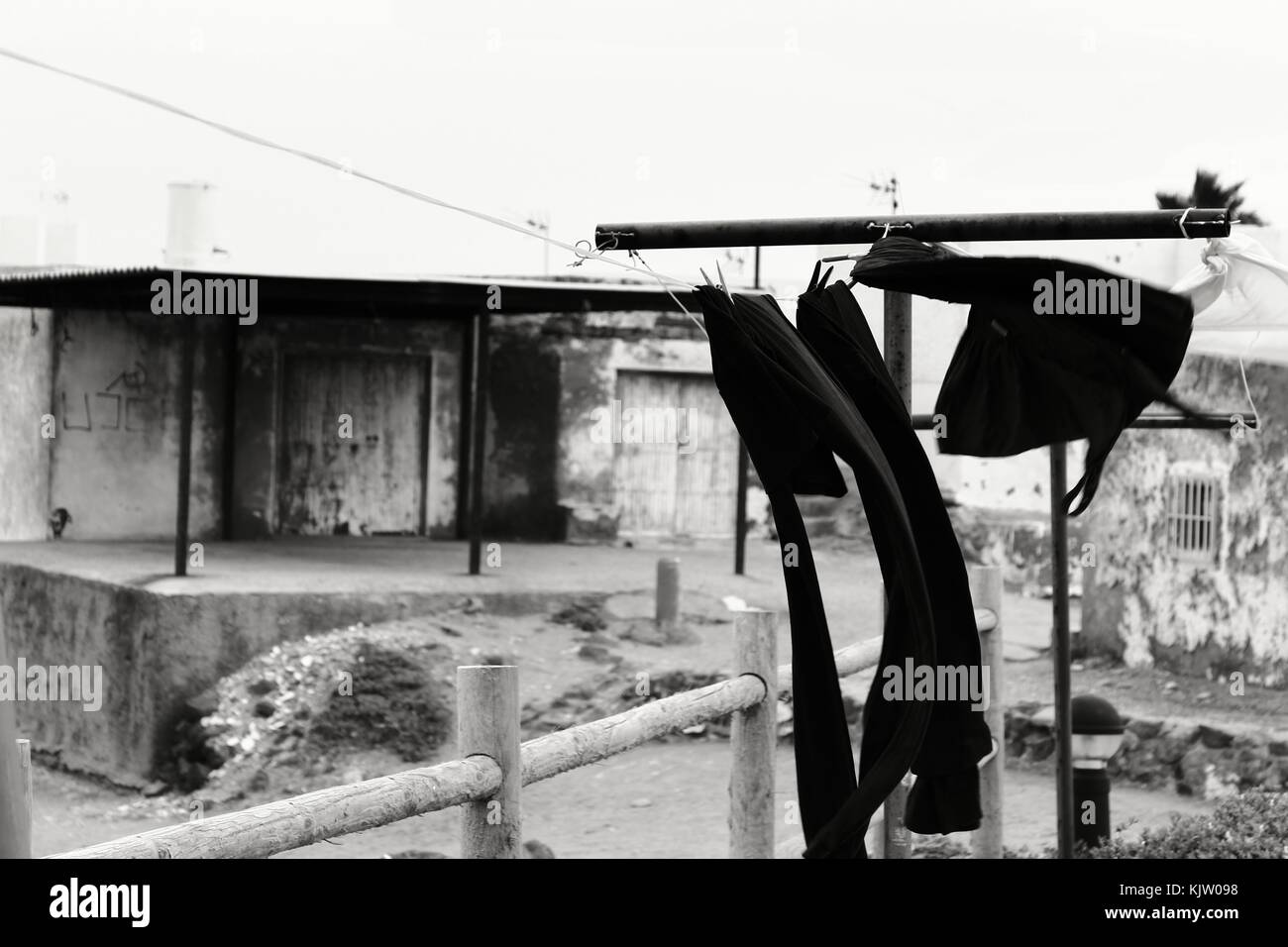 Clothes hanging drying in the sun in a small village Stock Photo - Alamy