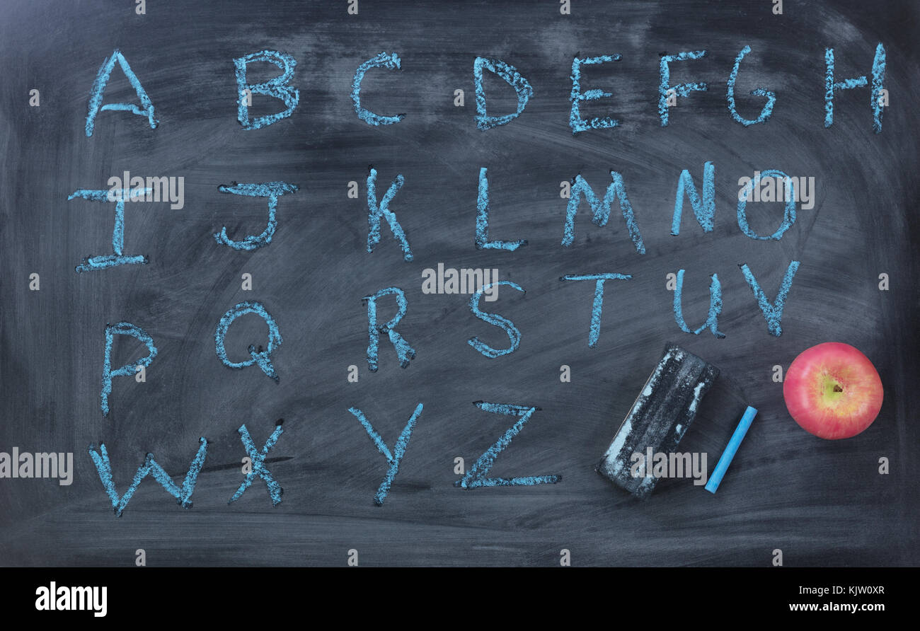 Chalkboard With Apple And Eraser