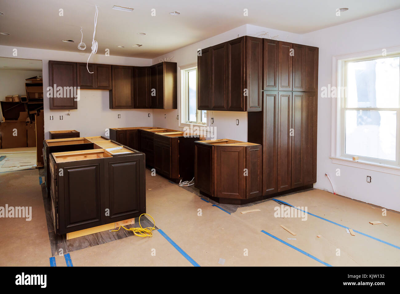 Custom kitchen cabinets in various stages of installation base for ...
