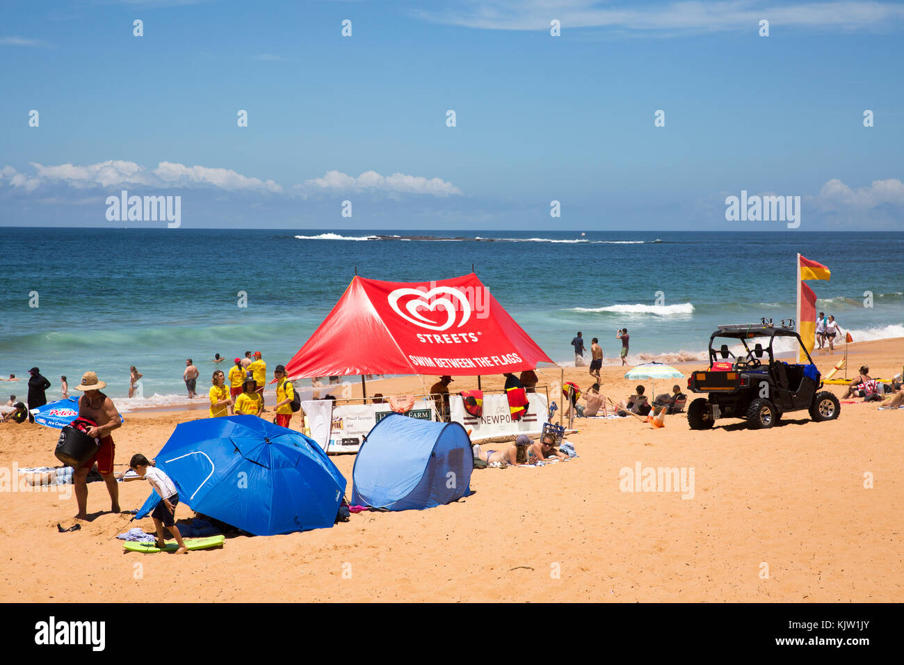 Beach sunbathing autumn hi-res stock photography and images - Alamy