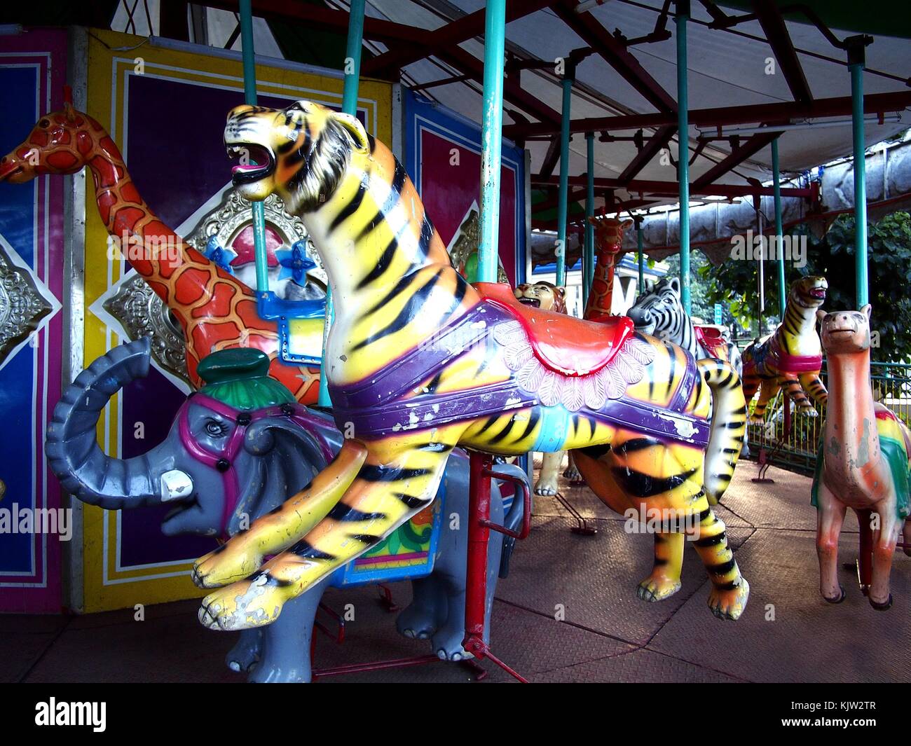 Photo of colorful carved animals of a carousel ride Stock Photo - Alamy