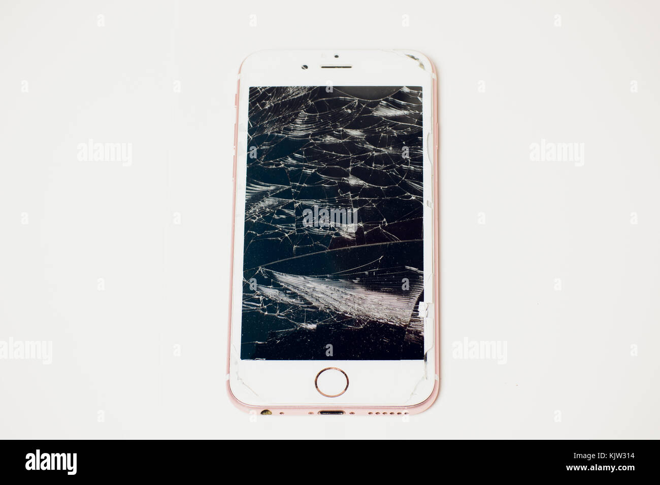 Modern mobile smartphone with broken screen isolated on white ...