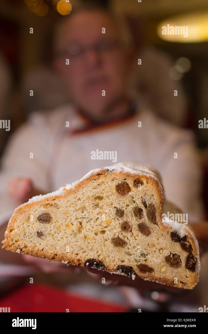 Michael Isensee, Stollen tester of the German Bread Institute, holds a ...