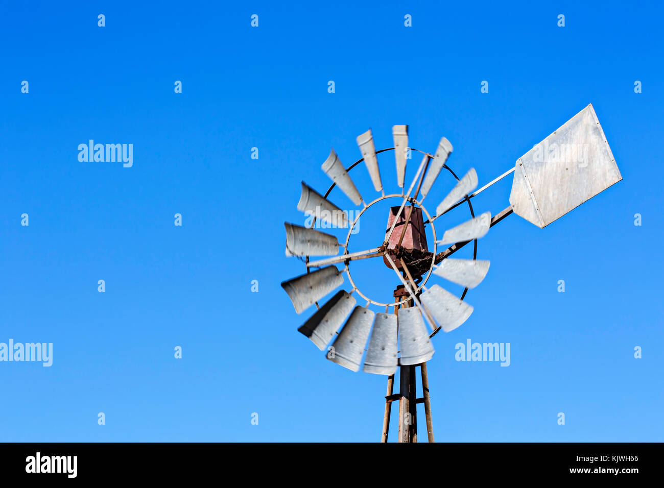 A windmill in a field Learmonth Victoria Australia.Learmonth is an ...