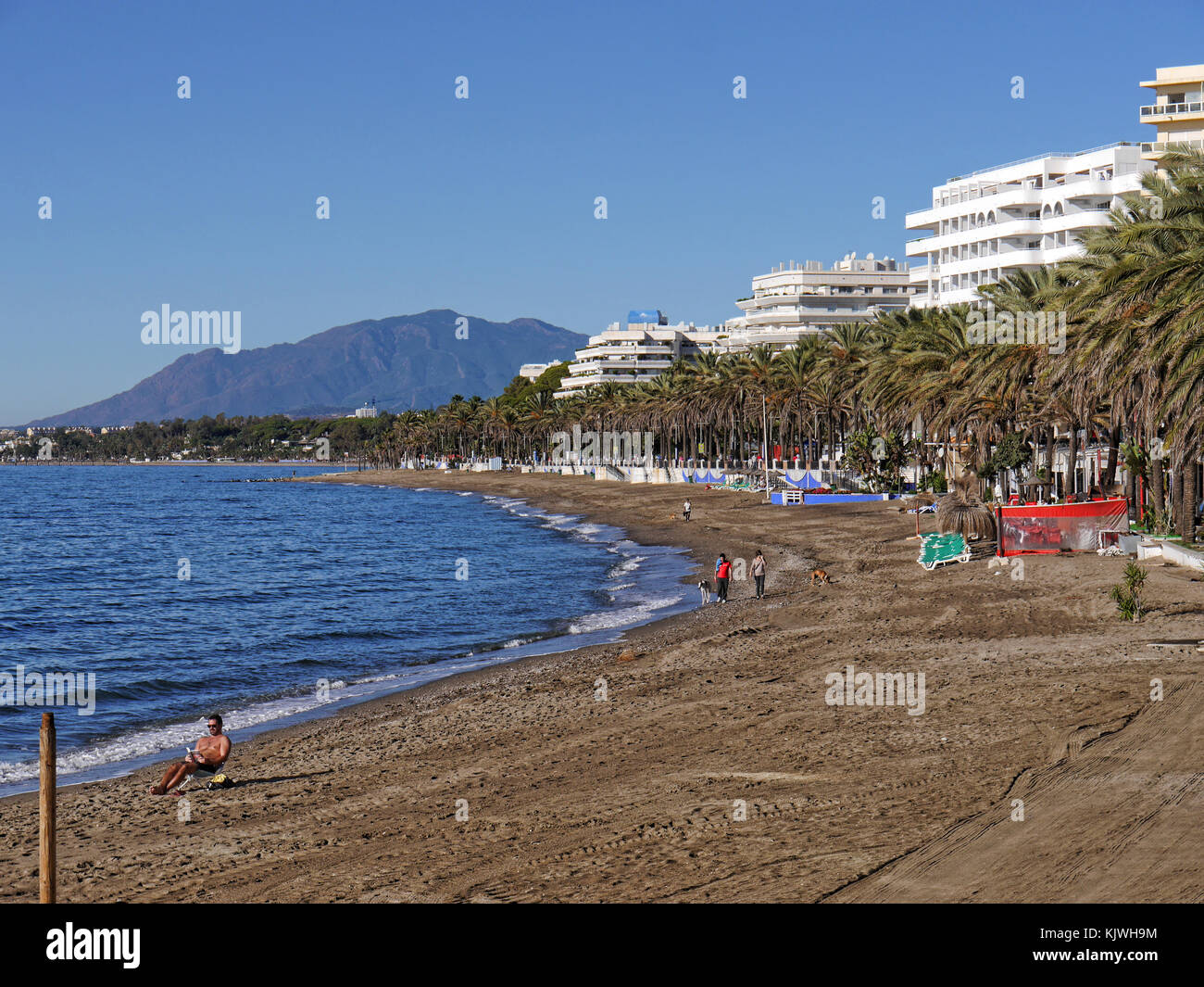 Beach scene in the Stylish Town of Marbella on the Costa del Sol Spain ...